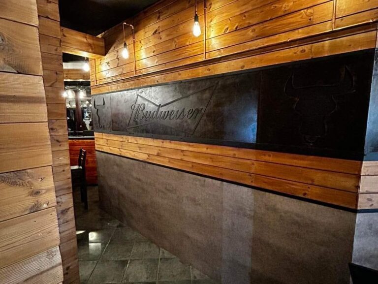 Innovative Vinyl Cladding Transforms Texan Wing Bar - Conway Flooring