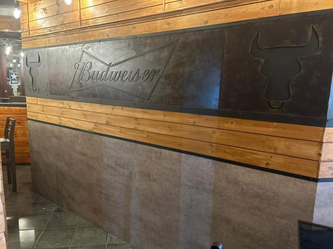 Innovative Vinyl Cladding Transforms Texan Wing Bar - Conway Flooring